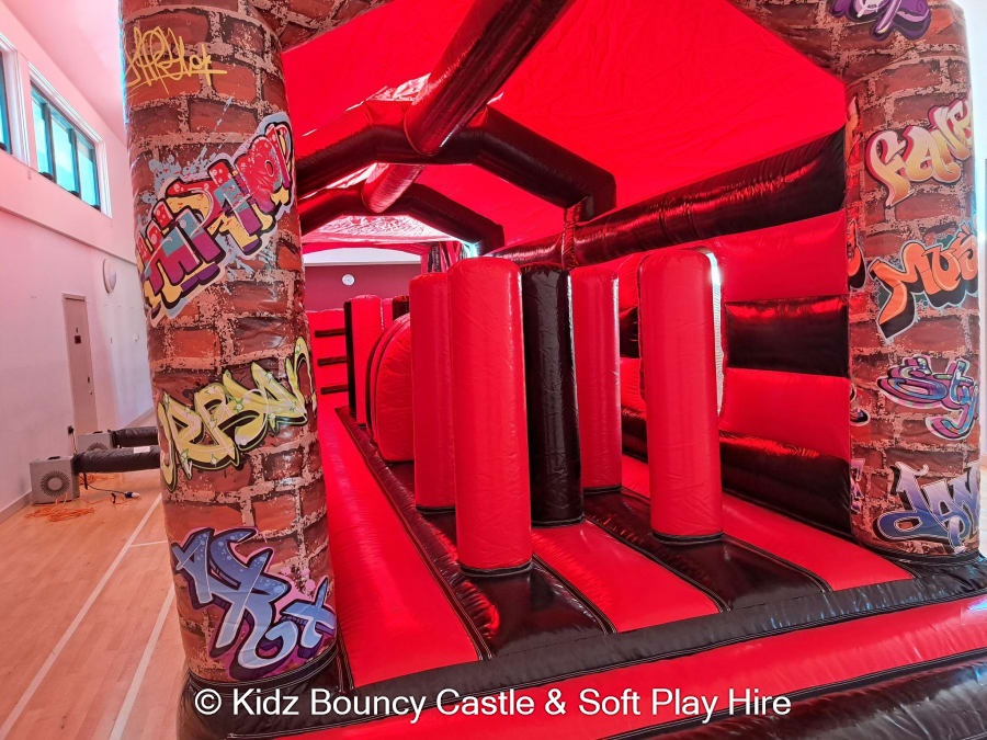 The all-new 45ft Graffiti inflatable obstacle course - Bouncy castle ...